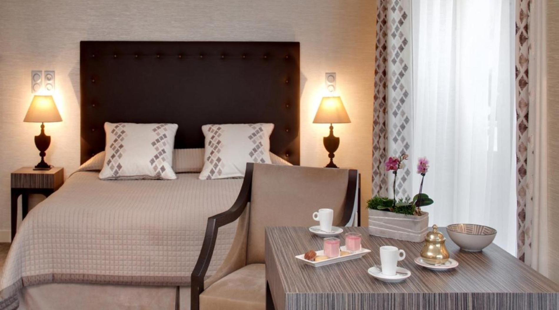 The hotel bedrooms are bright, airy, and most have small balconies ...